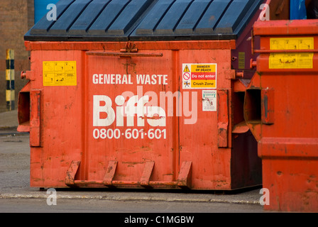 Red Biffa wheelie bin for disposal of waste paper Stock Photo - Alamy