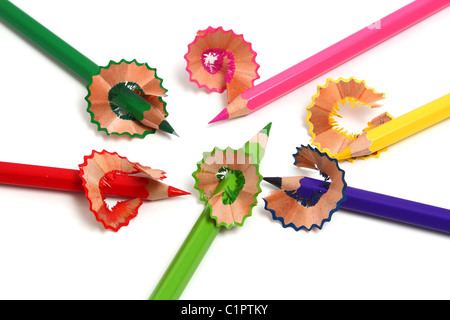 colors sharp pencils sharpener and shaving isolated on white background ...