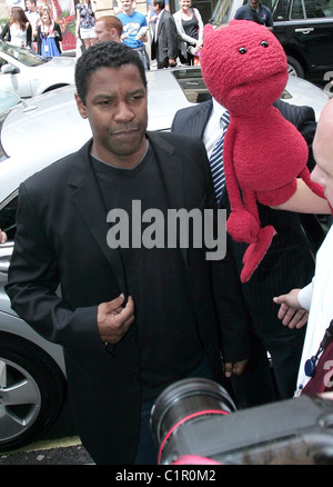 Denzel Washington is ambushed by the Virgin One Mascot "Red" as he ...