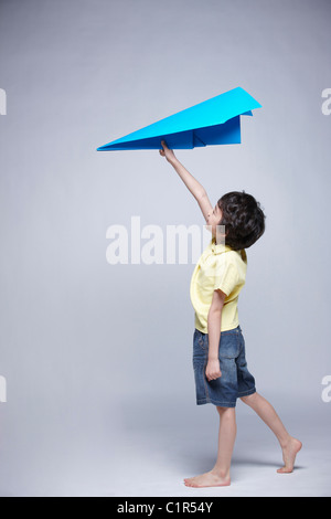 children education boy flying paper plane Stock Photo - Alamy
