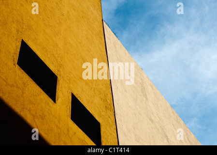 A close-up shot of a building facade with narrow long windows, Paris ...