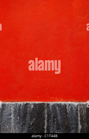 Red stucco wall, close-up Stock Photo - Alamy