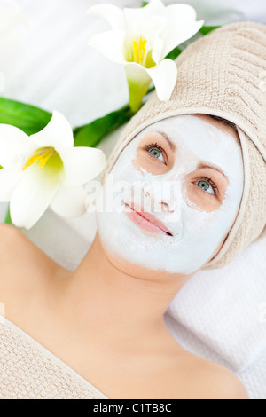 Beautiful woman with face cream on beige background, closeup Stock ...