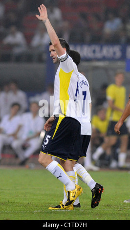 Tottenham Hotspur`s Robbie Keane with the trophy Barclays Asia Trophy ...