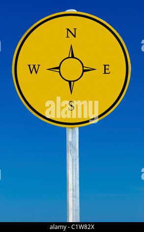 Compass hanging on wooden background, closeup Stock Photo - Alamy