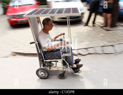 Solar-powered wheelchair Eco-friendly octogenarian Zhao Tianyun has ...