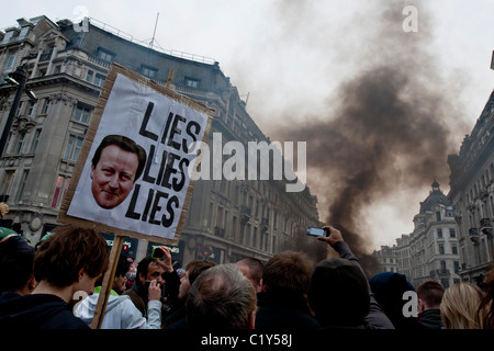 UK Uncut stage a protest which starts off with dancing in Oxford Circus ...