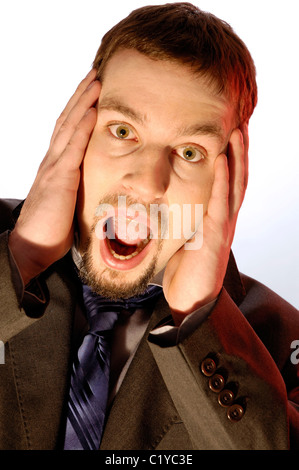 Shocked scared man with person in a Halloween grim reaper death costume ...