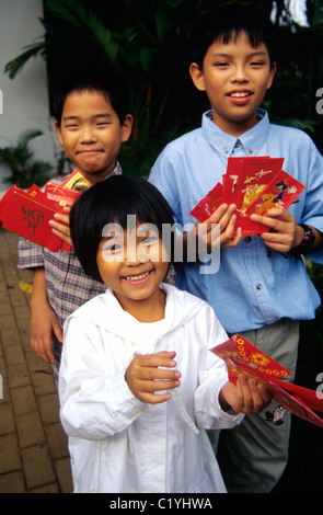 Three Chinese children Stock Photo - Alamy