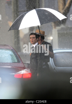Cillian Murphy shoots a scene in the rain on the set of his new movie ...