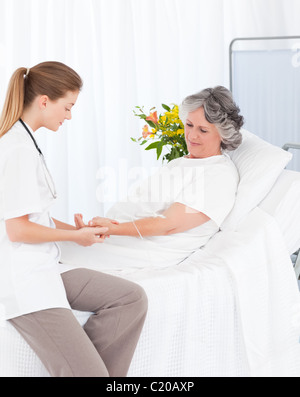 Arm of patient with drip Stock Photo - Alamy