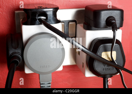 Overloaded electrical sockets (UK Stock Photo - Alamy