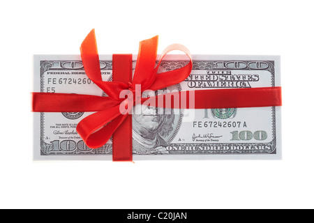 Photo of pack of dollars decorated with red ribbon over white ...
