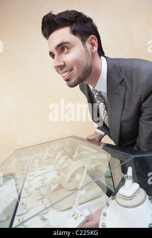 A male worker in a luxurious jewellery shop Stock Photo - Alamy