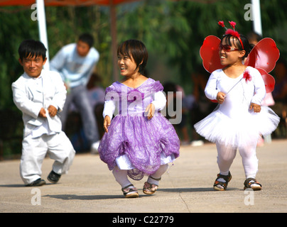 Mini-Land Little performers entertain visitors to Dwarf Kingdom, a ...
