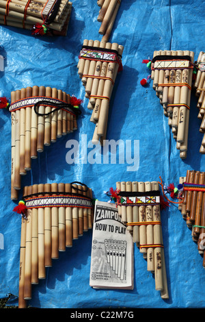 Traditional Andean music instruments for sale at a local market ...