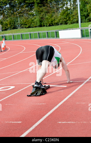 Concentrated male sprinter training Stock Photo - Alamy