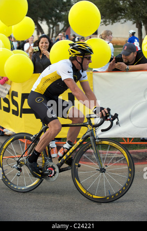 Lance Armstrong cycling at the start of the Livestrong Challenge which ...