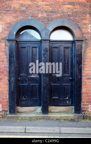 Two Black Doors Stock Photo - Alamy
