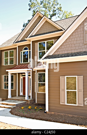Front door of newly built house closeup Stock Photo - Alamy