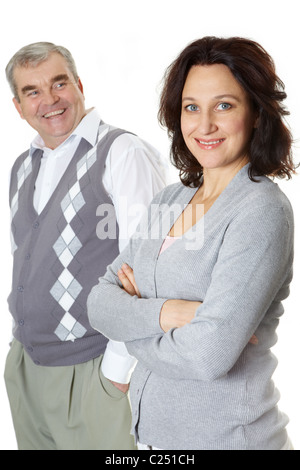Portrait of a husband and wife smiling while looking into each other's ...