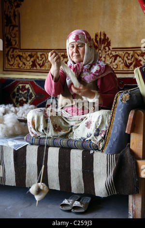 TURKISH WEAVER SPINS THE COTTON FOR KILIM RUGS FETHIYE TURKEY 15 ...