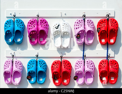 Crocs Shoes hanging on a display rack Stock Photo - Alamy