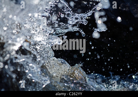 Photo of water crashing over rocks Stock Photo - Alamy