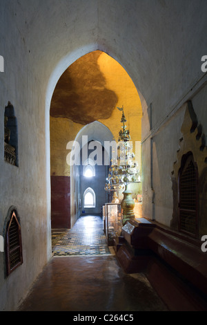 Interior of Ananda temple with corridors and lighting holes. Bagan ...