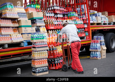 Coca Cola delivery van and staff unloading Cola bottles, Gibraltar ...