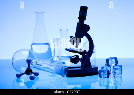 Laboratory glass in blue scenery Stock Photo - Alamy