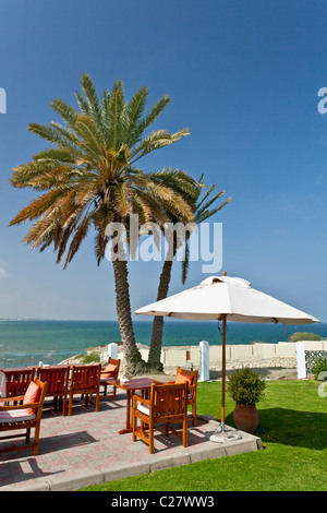 A seaside patio area at the Crown Plaza resort in Muscat, Oman Stock ...