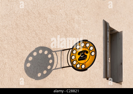 Old italian public telephone sign Stock Photo - Alamy