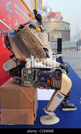 A robot made from discarded computer parts, on show at Bainaohui IT ...