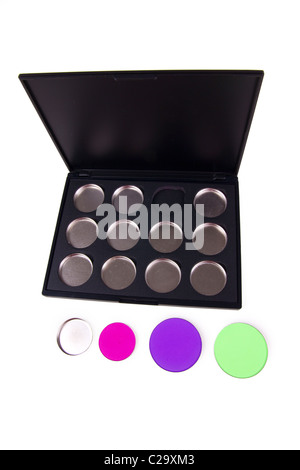 Paint color palettes on pink and white background Stock Photo - Alamy