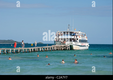 Holidaymakers aboard the glass bottomed Pollentia Cat enjoying a boat ...