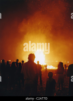 A crowd observing a fire Stock Photo - Alamy
