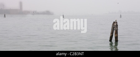 A beautiful shot of the Grand canal in Venice under a cloudy sky at ...