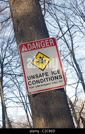 danger unsafe ice conditions sign with lake in background Stock Photo ...