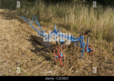old antique plough in field Stock Photo - Alamy