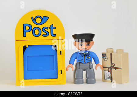 Lego postman delivering letter Stock Photo - Alamy