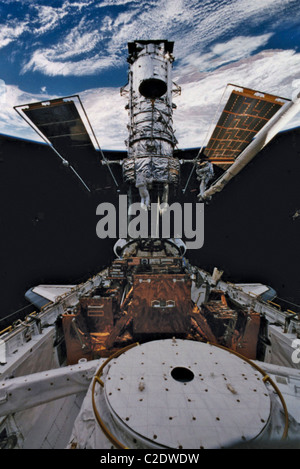 American astronaut Mark C. Lee attached to the end of the Remote ...