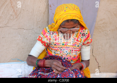 Woman doing embroidery, India Stock Photo - Alamy