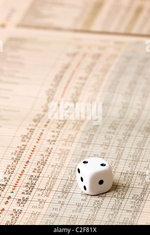 Dice sitting on a stock market chart Stock Photo - Alamy