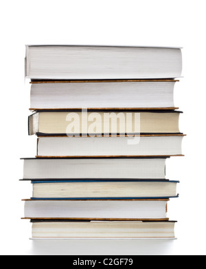 High stack of books isolated on white background Stock Photo - Alamy