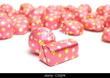 Brown Chocolate square shape candies flying around 3d illustration ...