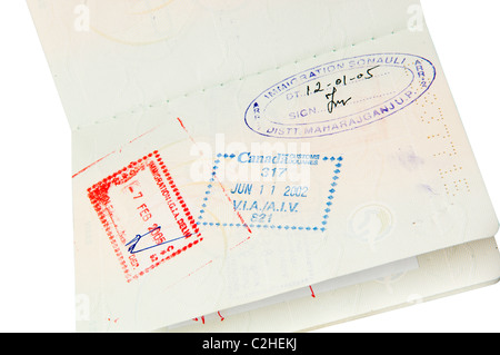 Travel passport with multiple visa stamps, entry and exit marks, border ...