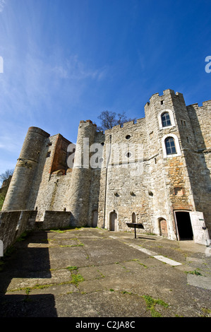 Historic stone fortification wall with crenellations, displayed under a ...