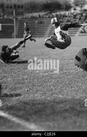Taking Flight on the Football Field Stock Photo - Alamy
