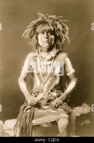 Honovi-Walpi snake priest, with Totkya Day painting, c1910. Hopi snake ...